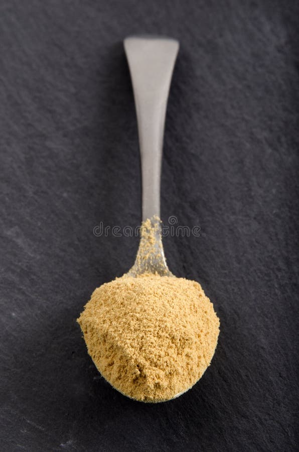 Ground Ginger Powder on a Spoon Stock Image - Image of cuisine, slate ...