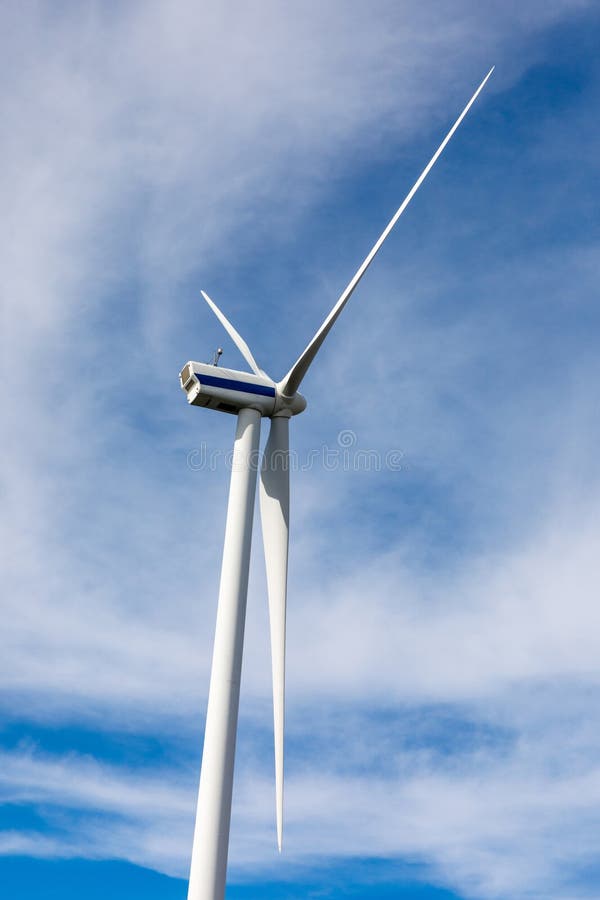 Ground Low View on Wind Propeller Turbine, Blue Sky, and Clouds. Stock ...