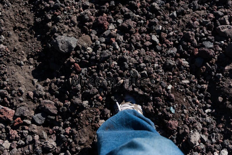 Footstep on Volcanic Rocks – Walking on Rugged Lava Terrain Stock Image ...