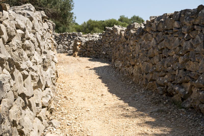 Ground Road between Walls Made of Stone Stock Image - Image of rocks ...