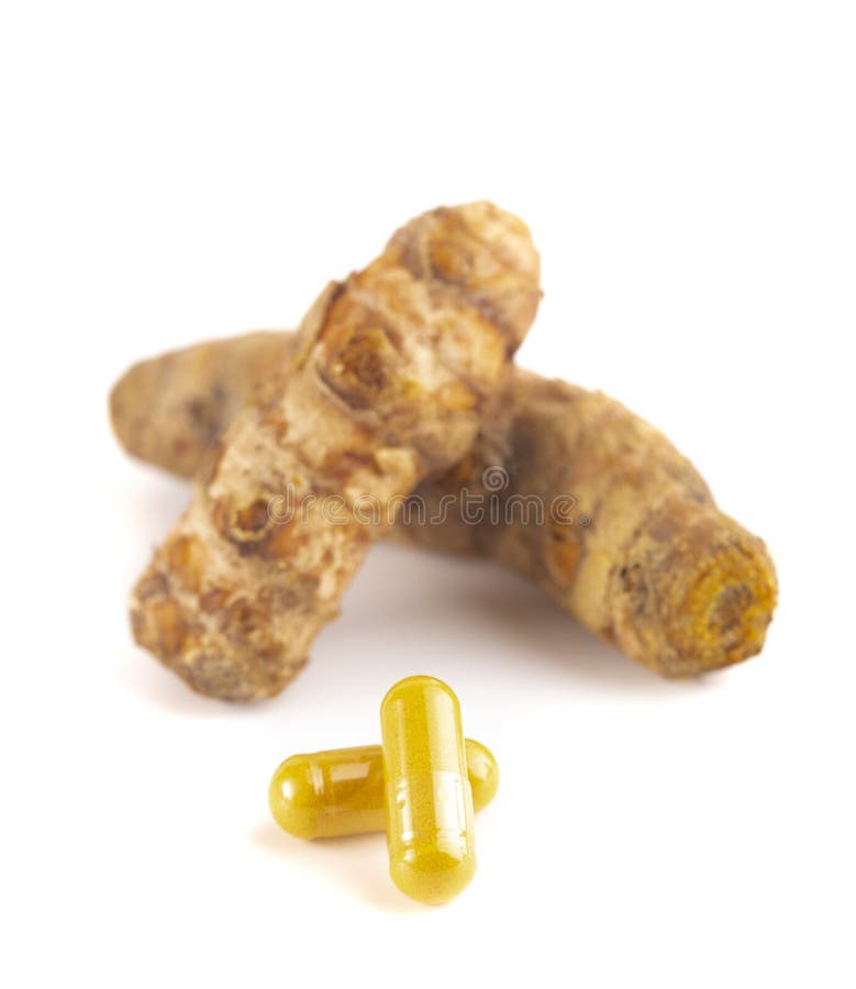 Ground Turmeric in Capsule Form on a White Background Stock Image ...