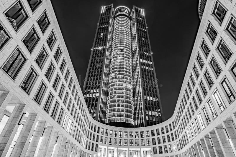 The Ground View of a Skyscraper in a Modern City at Night Editorial ...