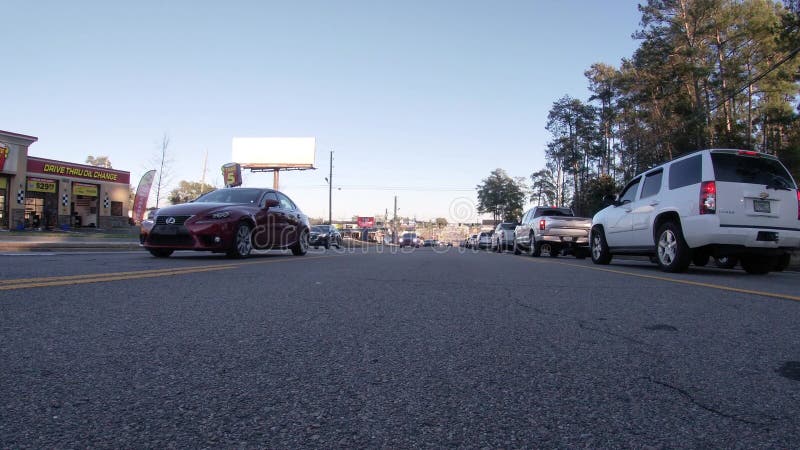 POV Ground View Street Driving Pulling into a Gas Station Stock Video ...