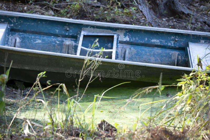 Grounded Boat in Harbor stock image. Image of ocean, blue - 7544749
