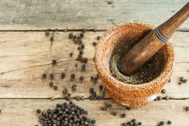 Grounded Black Pepper in Wooden Mortar Stock Image - Image of powder ...