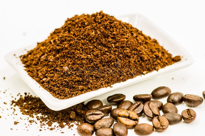 Freshly Grinded Coffee Being Emptied Onto Coffee Holder Stock Photo ...