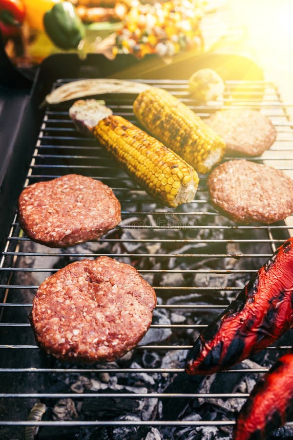 Grounded Meat and Corn Cooked Outdoors on Grill Stock Image - Image of ...