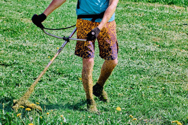 Groundskeeper Uses String Weed Trimmer without Protecting His Skin with ...