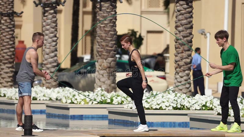 Group of Acrobats Jumping with Double Jump Rope in Dubai Doing ...