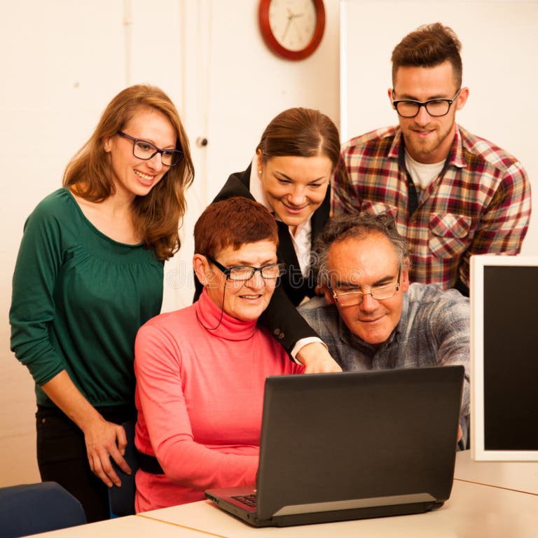 Group of Adults Learning Computer Skills. Intergenerational Tran Stock ...