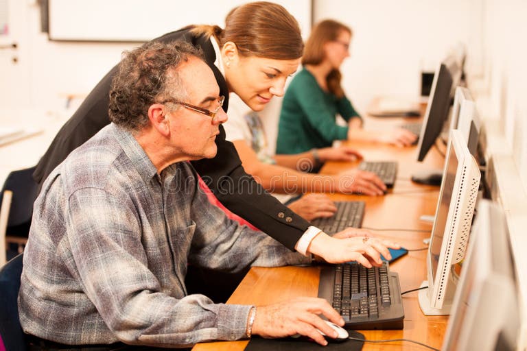 Group of Adults Learning Computer Skills. Intergenerational Tran Stock ...