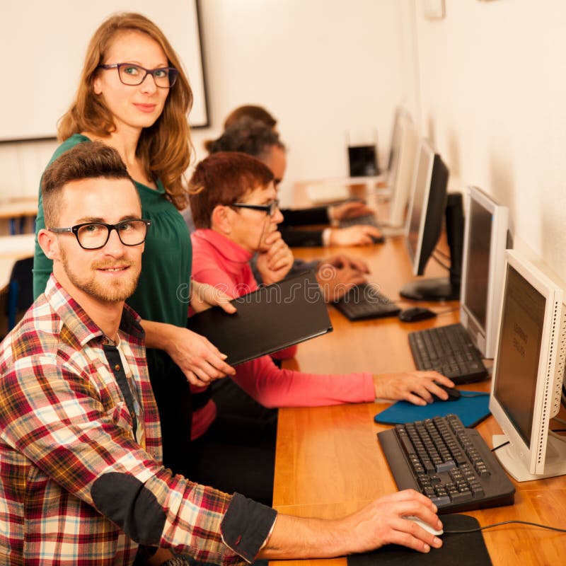 Group of Adults Learning Computer Skills. Intergenerational Tran Stock ...