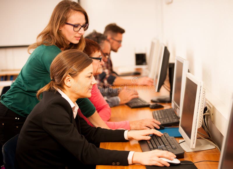 Group of Adults Learning Computer Skills. Intergenerational Tran Stock ...