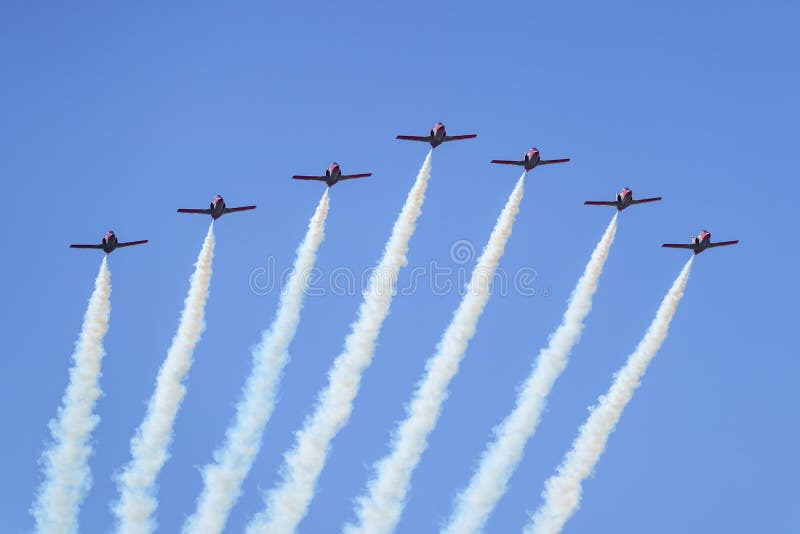 Group of Aerobatics Flying in Formation Close Together and Forming Jets ...