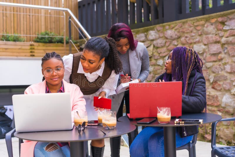 Group of African American Businesswomen during a Teamwork Stock Photo ...