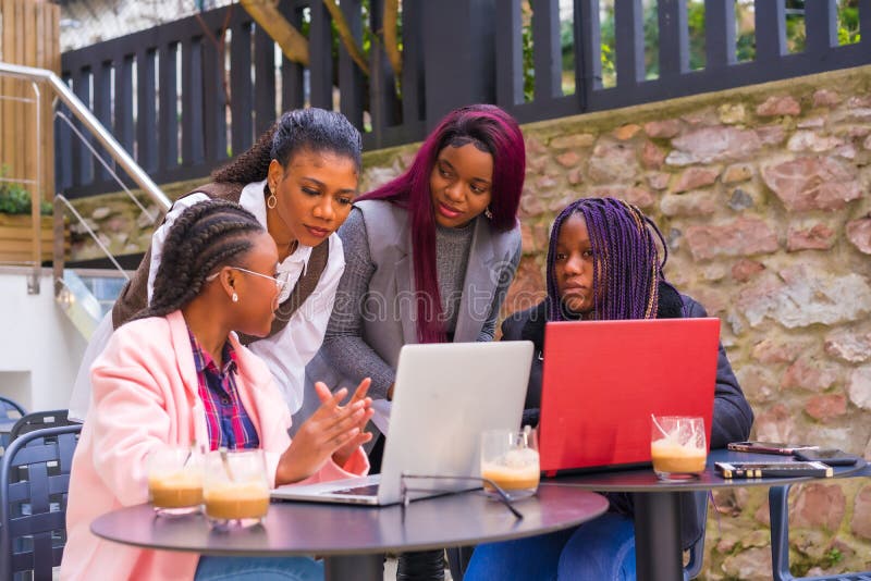 Group of African American Businesswomen during a Teamwork Stock Photo ...