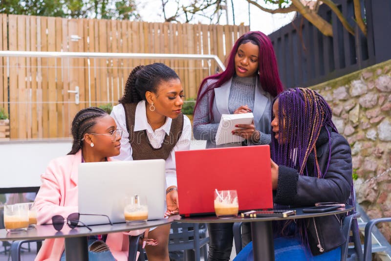 Group of African American Businesswomen during a Teamwork Stock Image ...