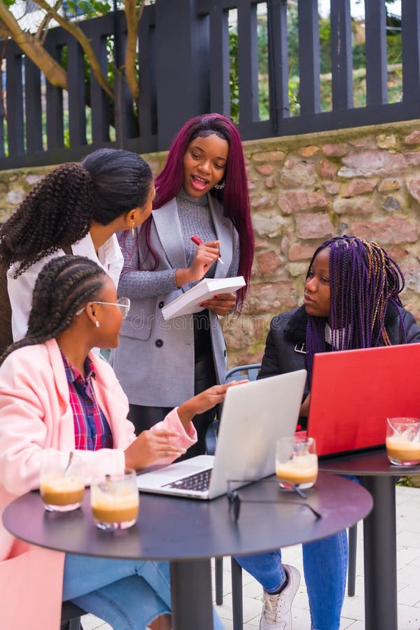 Group of African American Businesswomen during a Teamwork Stock Photo ...