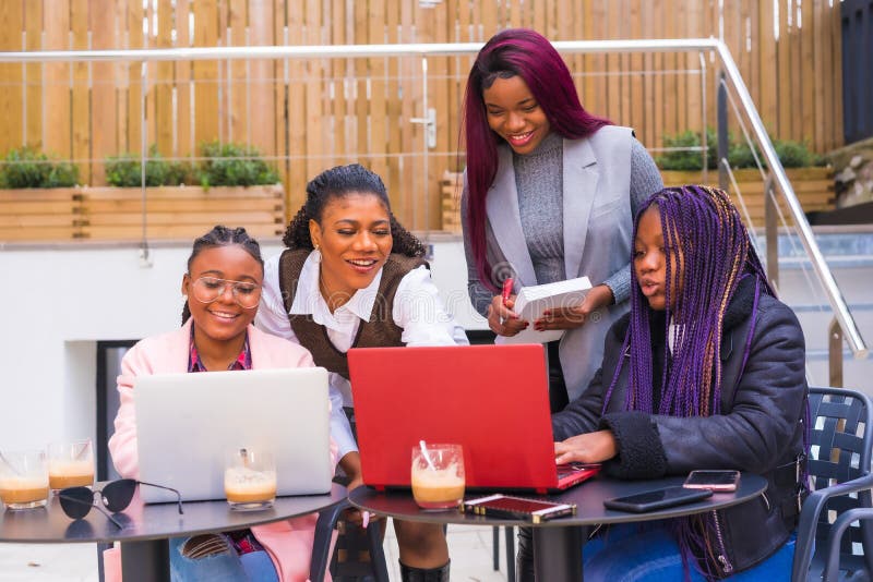 Group of African American Businesswomen during a Teamwork Stock Photo ...