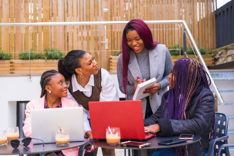 Group of African American Businesswomen during a Teamwork Stock Photo ...