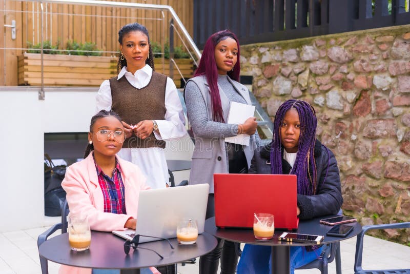 Group of African American Businesswomen during a Teamwork Stock Photo ...
