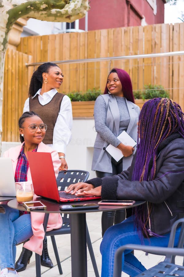 Group of African American Businesswomen during a Teamwork Stock Photo ...