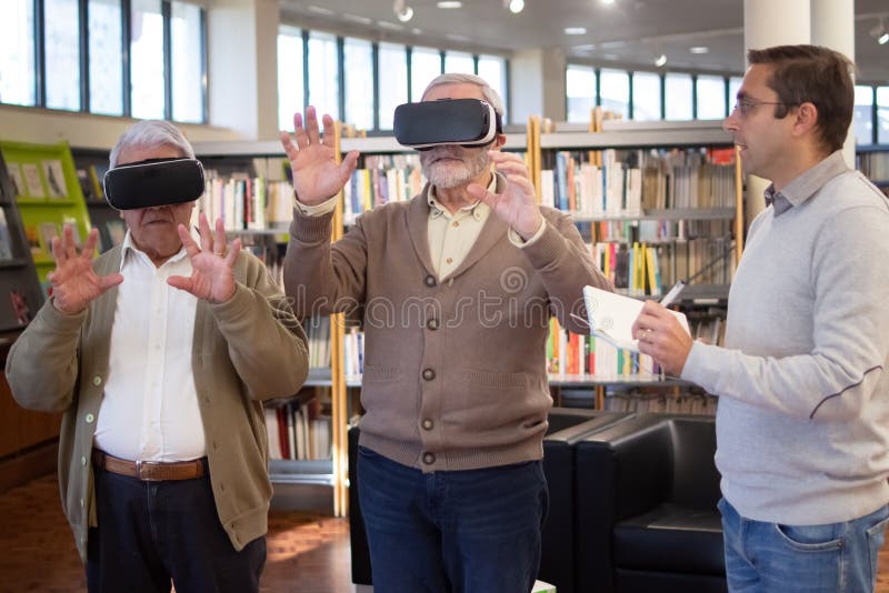 Group of Aged Students Studying with Teacher Stock Photo - Image of ...