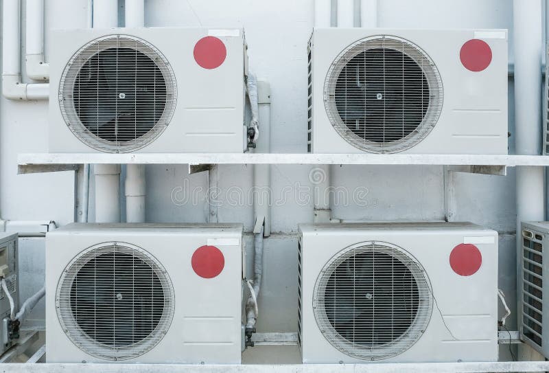 Group of Air Compressors Outside the Industry Building Wall. Air ...