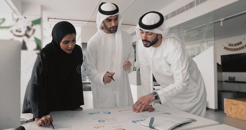 Group of Arabic Professionals Make Infographic Data Analysis Stock ...