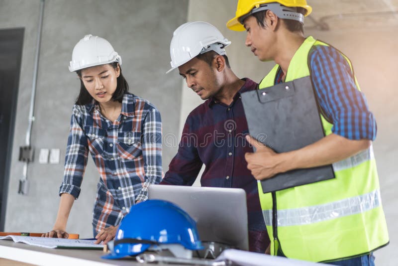 Architect Look at Blueprint and Planning To Renovation Room Stock Image ... Architect Look at Blueprint and Planning To Renovation Room Stock Image ...