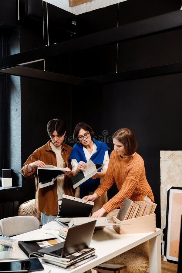 Group of Architects Choosing Materials for Interior Design Project in ...