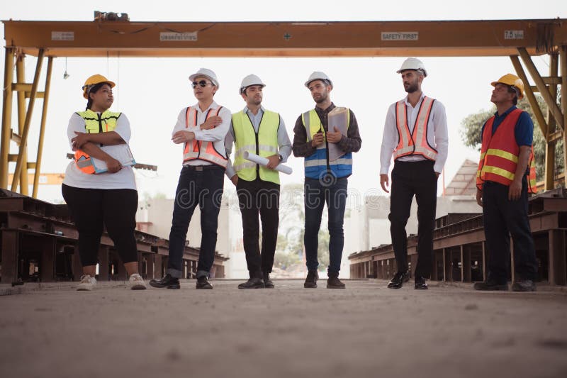 Group of Architects, Construction Foremen, and Construction Engineers ...