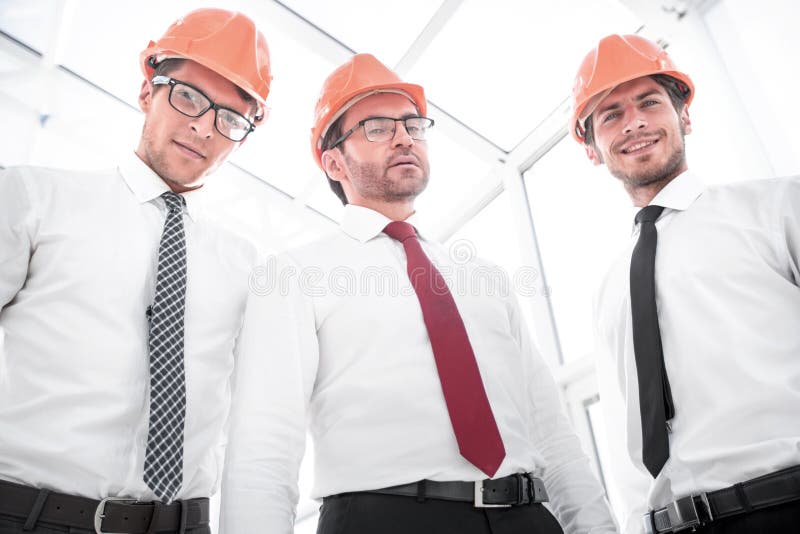 Group of Architects of Designers on the Background of the Office. Stock ... Group of Architects of Designers on the Background of the Office. Stock ...