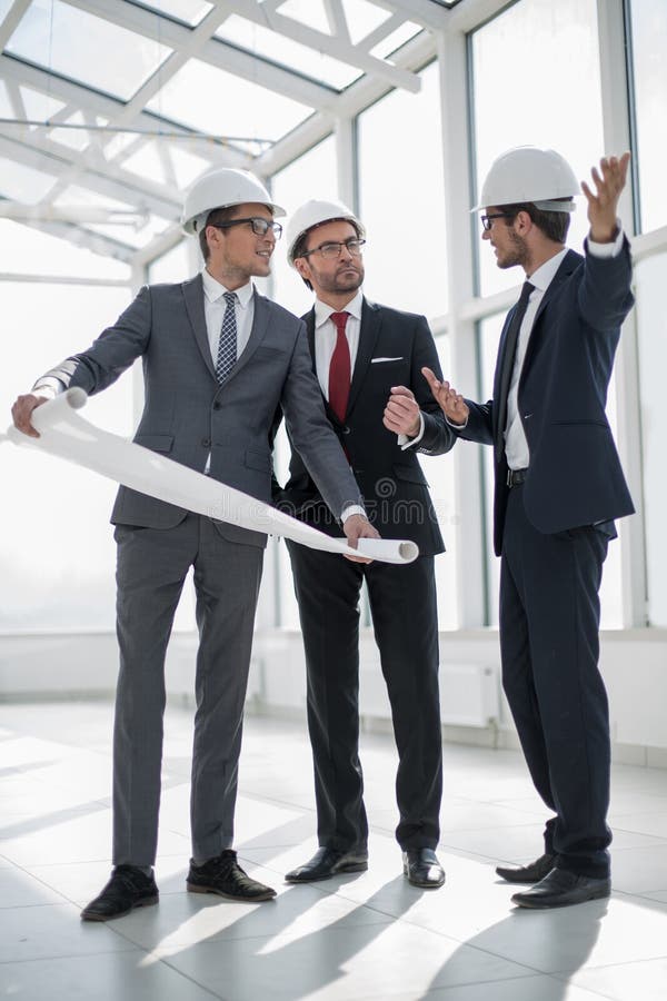 Group of Architects Discussing Ideas for a New Project Stock Photo ...