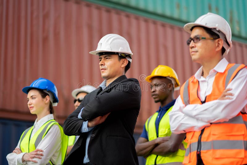Group of Architects and Engineers at a Construction Site Smiling ...
