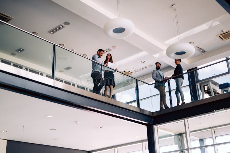 Group of Architects Having Discussion in Hall Stock Photo - Image of ...