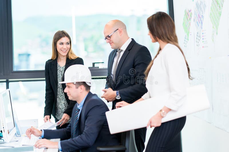 Group of Architects Having Meeting. Solving Problems and Making Stock ...