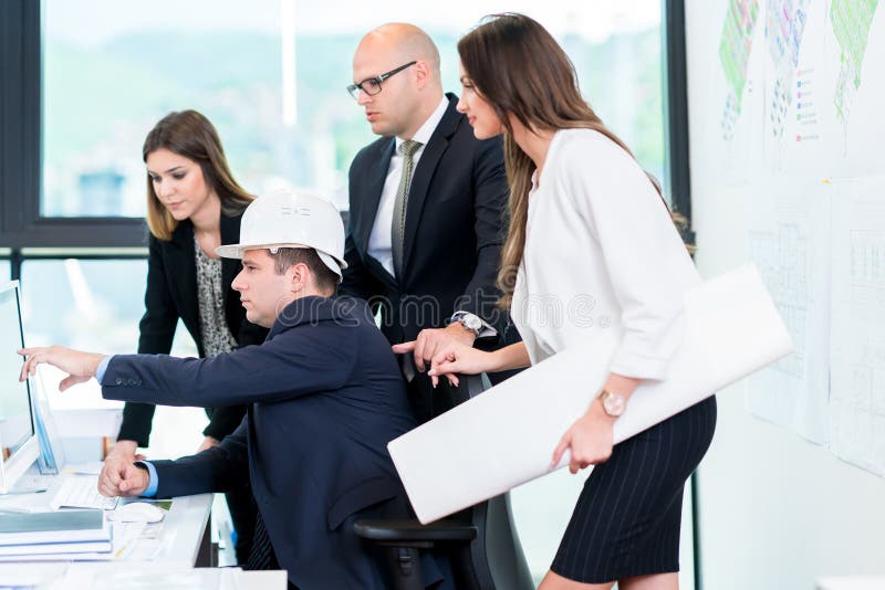 Group of Architects Having Meeting. Solving Problems and Making Stock ...