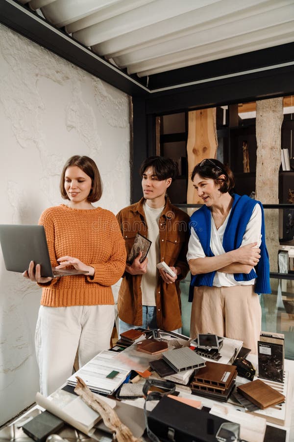 Group of Architects Using Laptop while Working on Interior Design ...