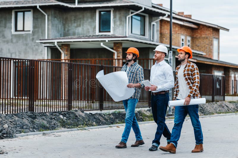 Group of Architects Walking by Building Street Stock Photo - Image of ...