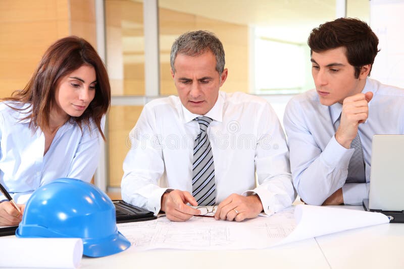 Group of Architects at Work Stock Image - Image of sitting, project ...