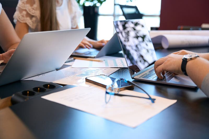 Group of Architects Working on Laptops at New Building Project Stock ...