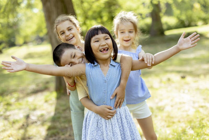 Group of Asian and Caucasian Kids Having Fun in the Park Stock Image ...