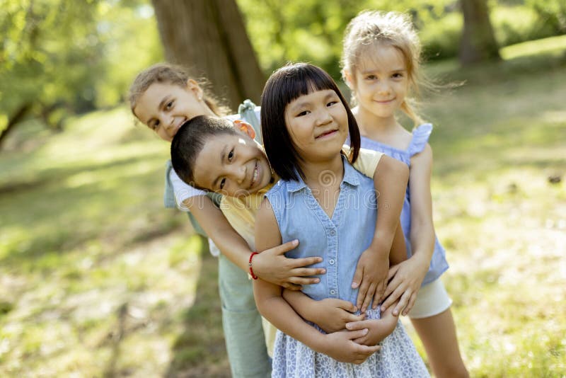 Group of Asian and Caucasian Kids Having Fun in the Park Stock Image ...