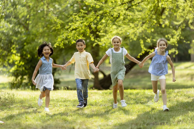 Group of Asian and Caucasian Kids Having Fun in the Park Stock Photo ...