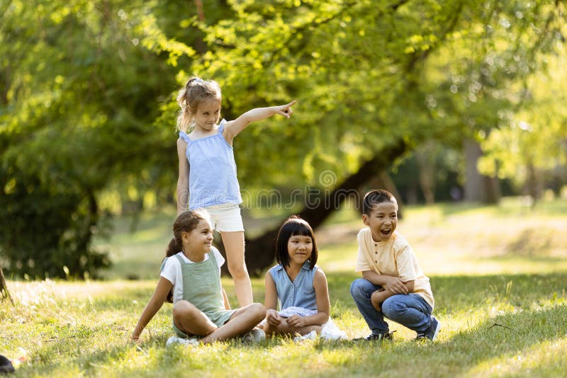 Group of Asian and Caucasian Kids Having Fun in the Park Stock Photo ...