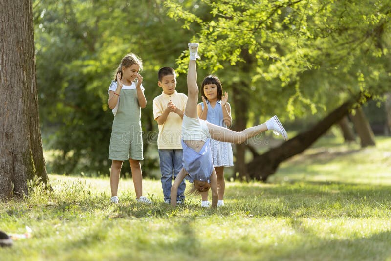 Group of Asian and Caucasian Kids Having Fun in the Park Stock Photo ...