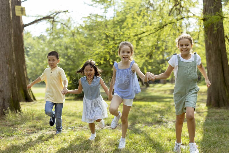 Group of Asian and Caucasian Kids Having Fun in the Park Stock Image ...