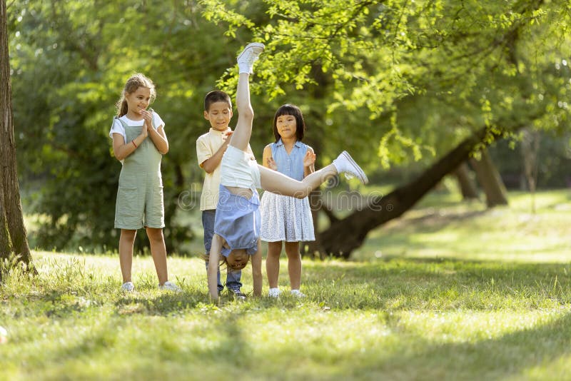 Group of Asian and Caucasian Kids Having Fun in the Park Stock Photo ...