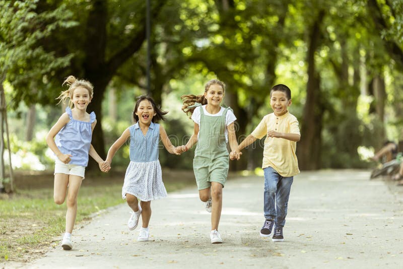 Group of Asian and Caucasian Kids Having Fun in the Park Stock Photo ...
